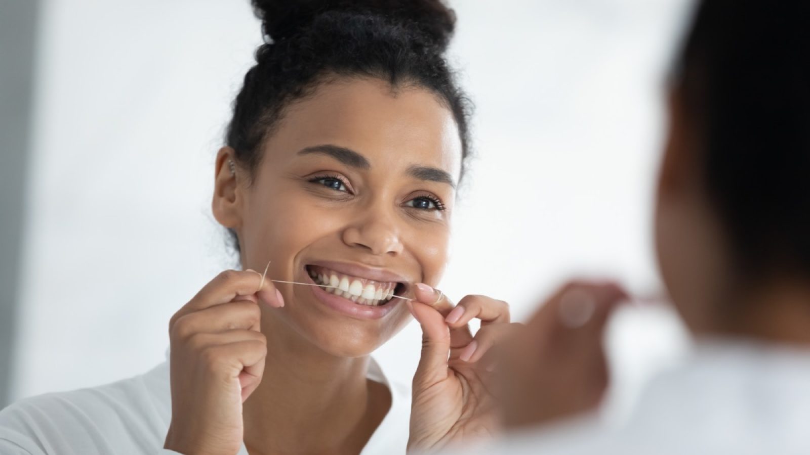 What Happens If You Don’t Floss Your Teeth at Night — Best Life